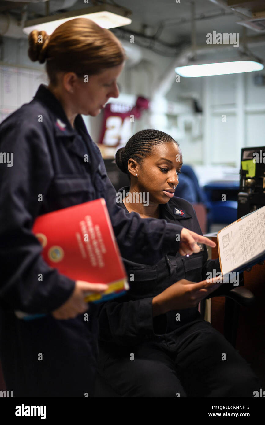 ARABIAN GULF (Dec. 5, 2017) Legalman 2nd Class Diandra Johnson and ...