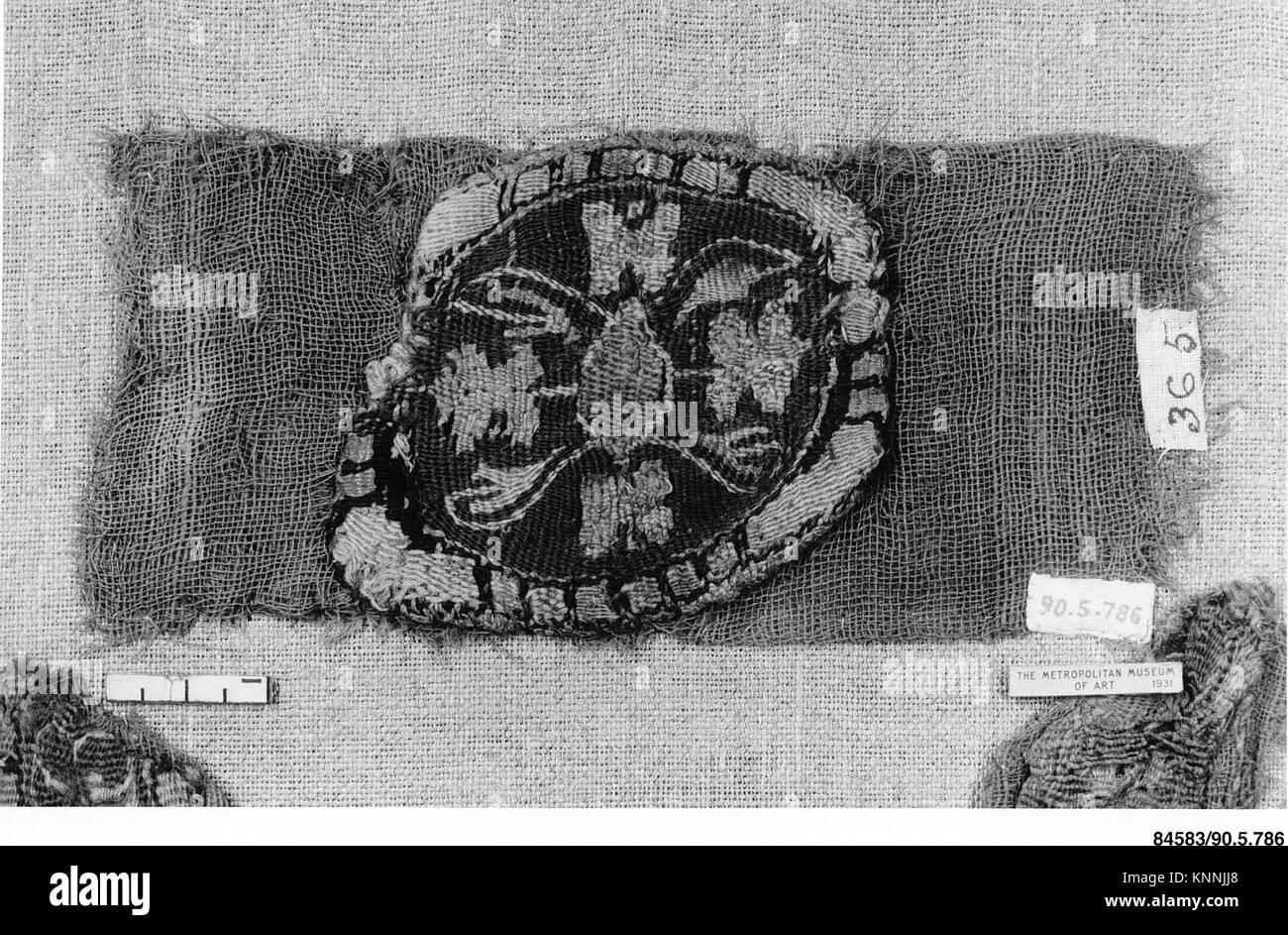 A preserved fragment of a historical object showing remnants of its ...