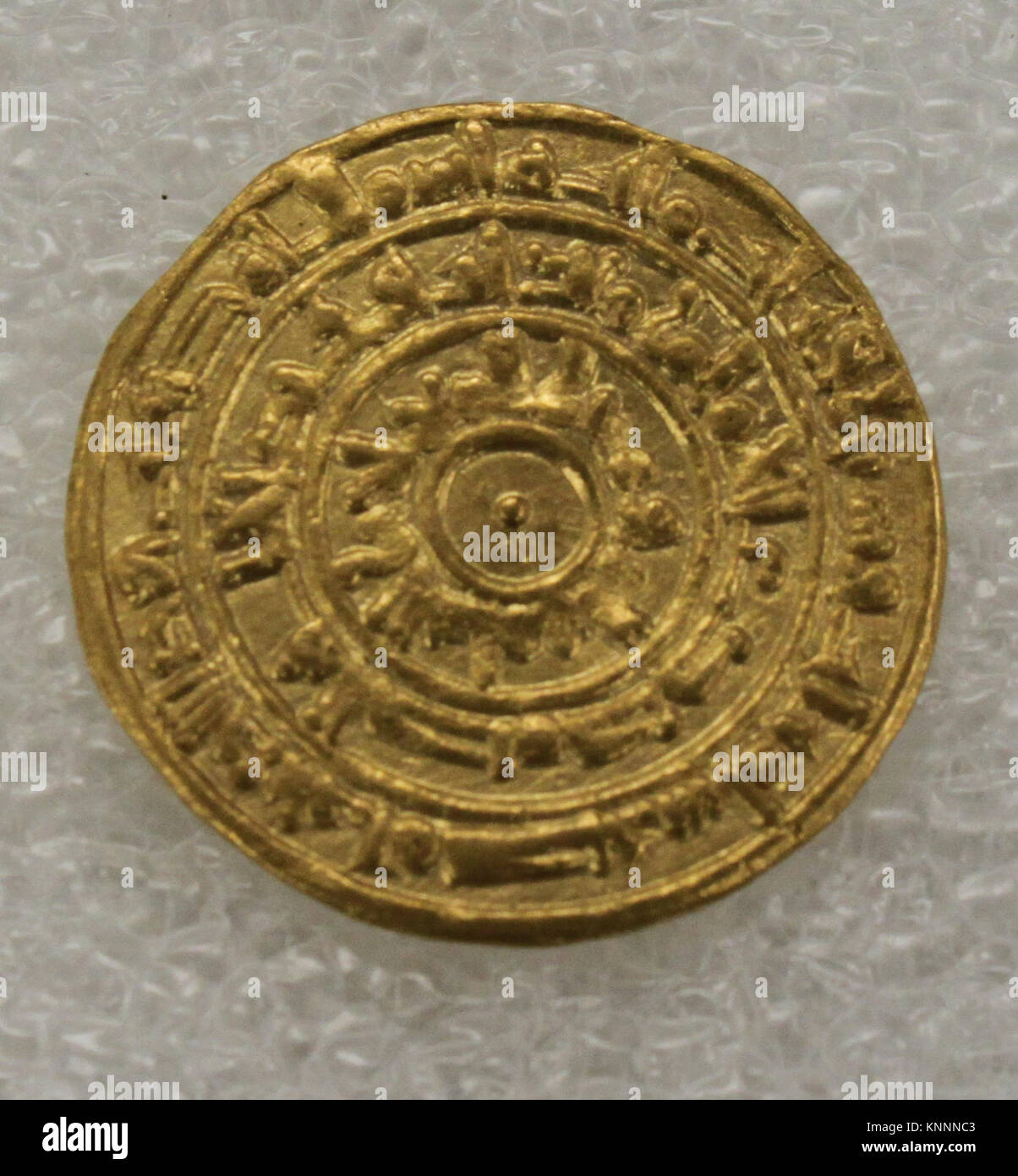 A coin from the MET, catalog numbers 04.35.3340a and 444955, showing ...
