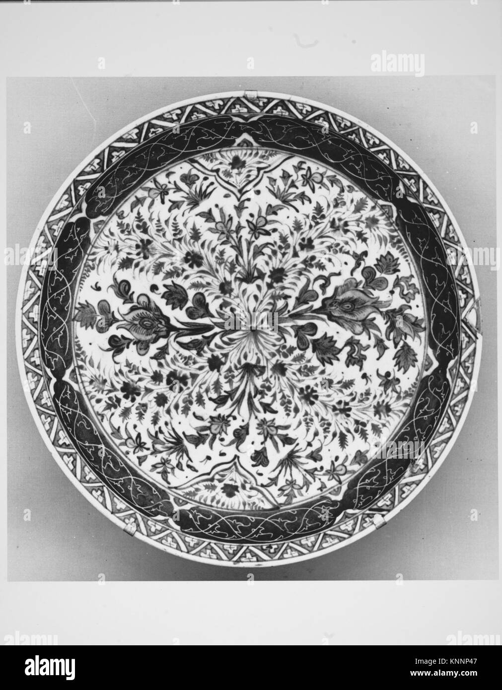 This ceramic dish is decorated with floral patterns, showcasing ...