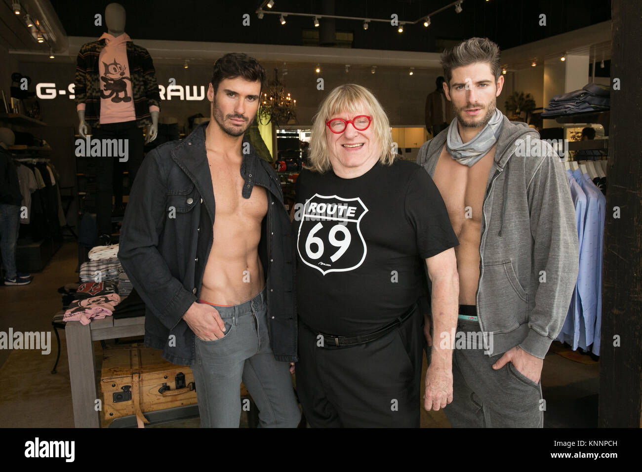 Comedy writer Bruce Vilanch poses at LASC with male models Timo Nunez ...