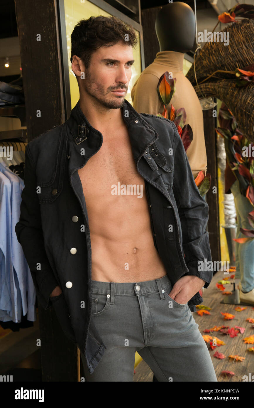 Comedy writer Bruce Vilanch poses at LASC with male models Timo Nunez and Adam Nicklas to ...