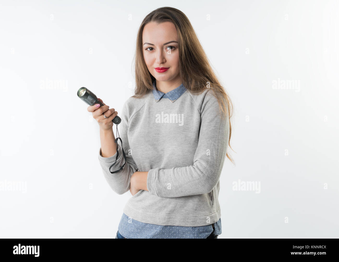 Woman holding an electrical torch flashlight Stock Photo - Alamy