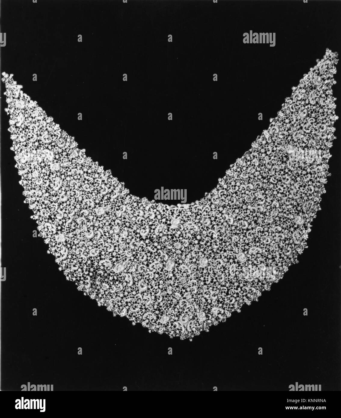 A historical textile cape preserved in a museum collection ...