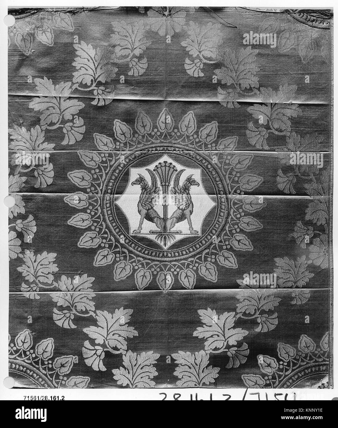 This chair seat is a historical furniture component, demonstrating ...