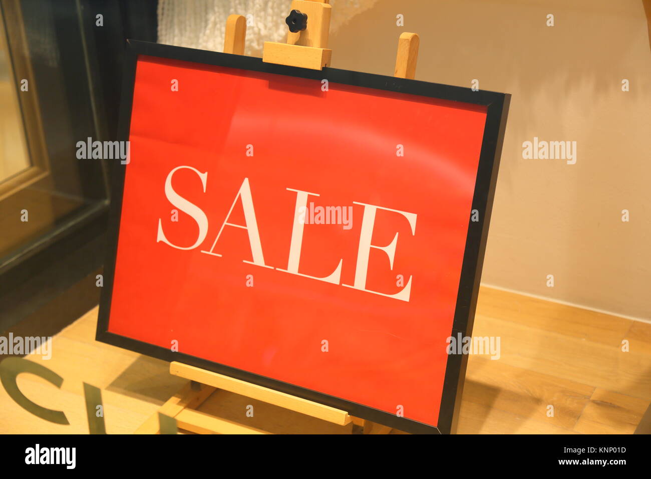 sale sign on shop display Stock Photo - Alamy