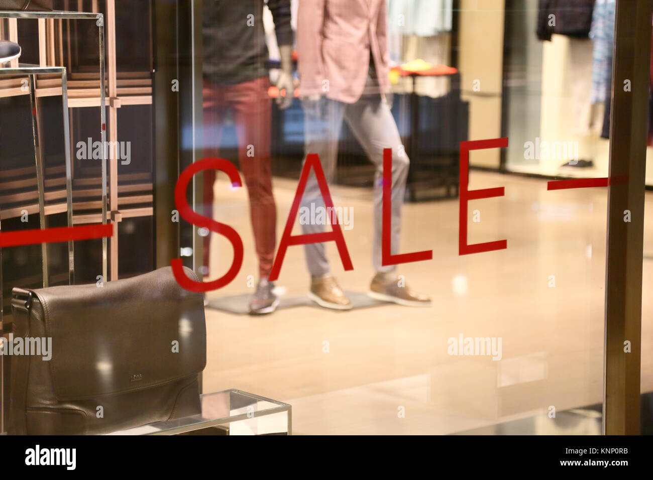 sale sign on shop display Stock Photo - Alamy