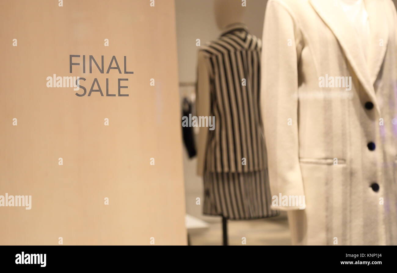 sale sign on shop display Stock Photo - Alamy