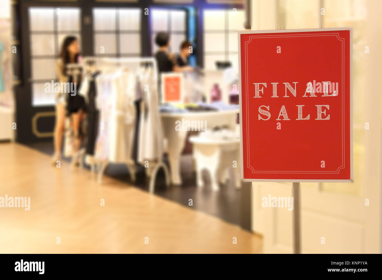 sale sign on shop display Stock Photo - Alamy
