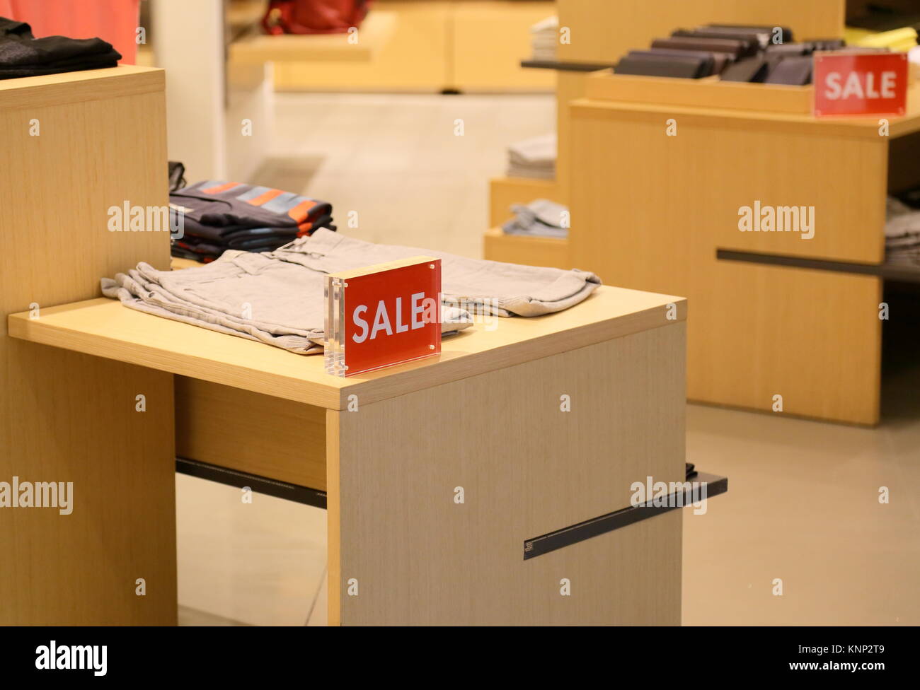 sale sign on shop display Stock Photo - Alamy