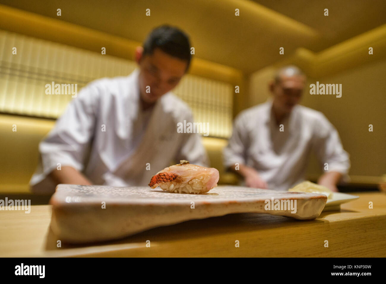 Sawara (Spanish mackerel) sushi at an omakase sushi restaurant Stock ...