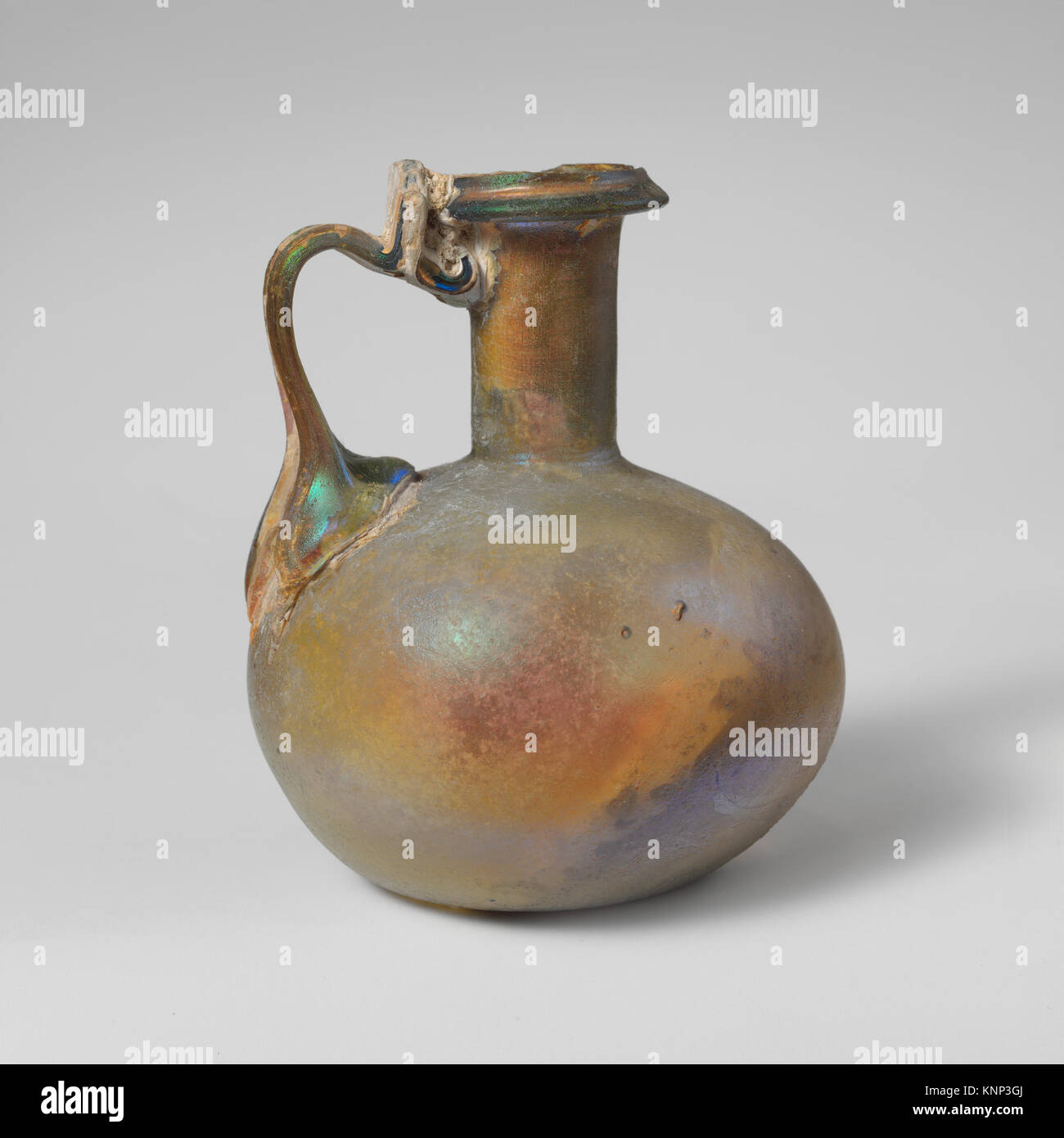 A clear glass jug from the Metropolitan Museum of Art, cataloged as ...