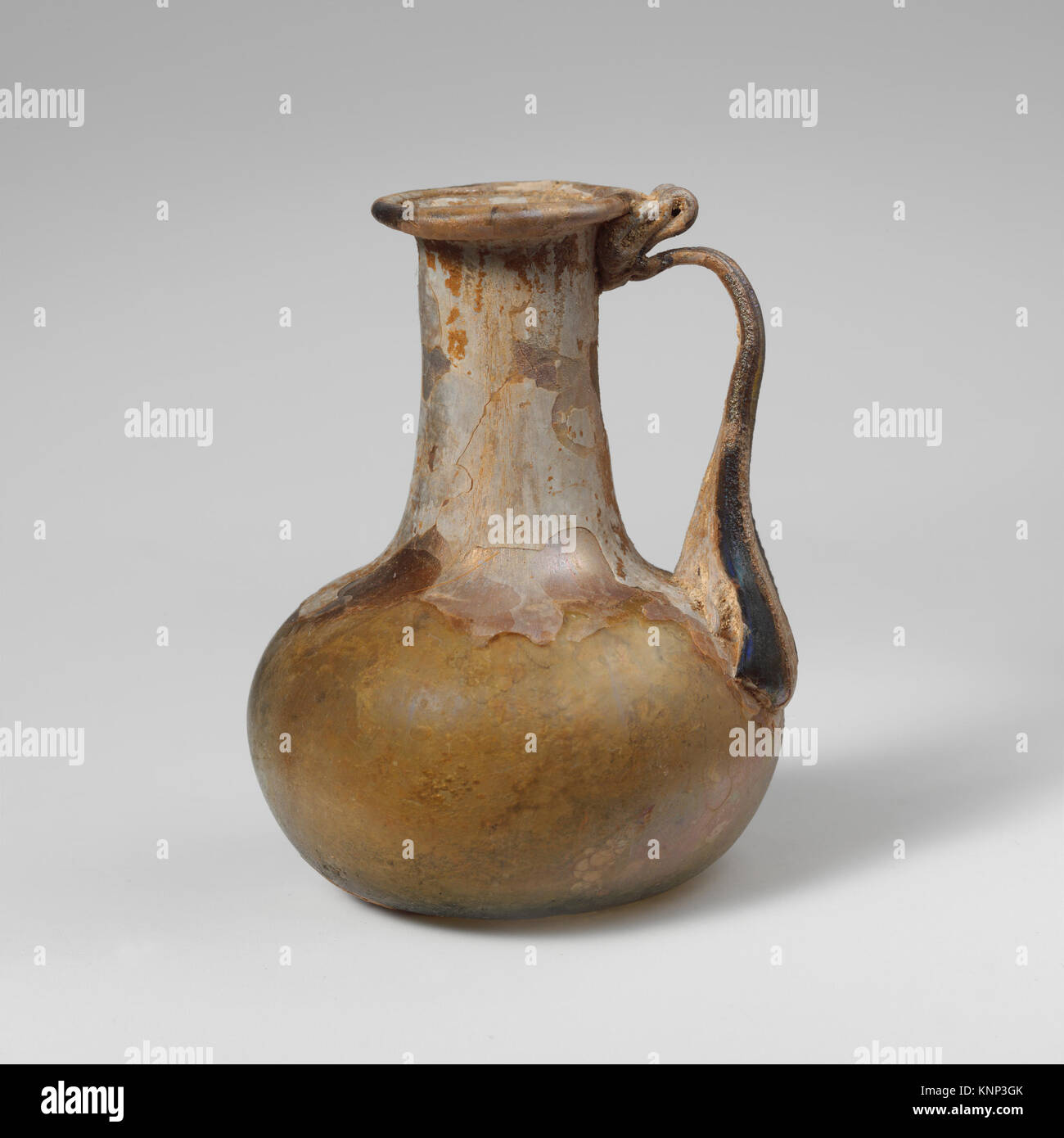 A clear glass jug from the Metropolitan Museum of Art, cataloged as ...