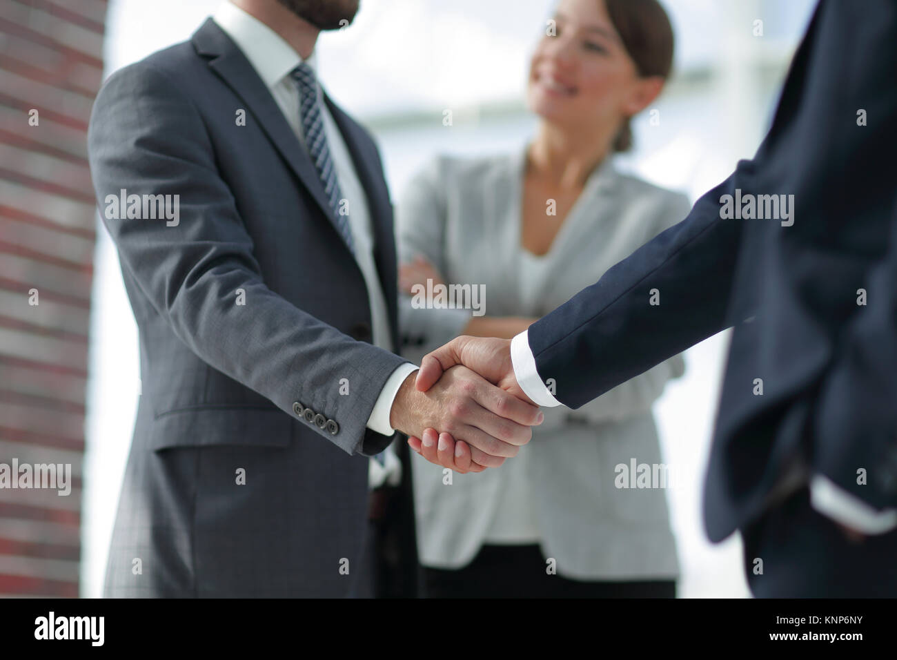 Two Business men shaking hands Stock Photo - Alamy