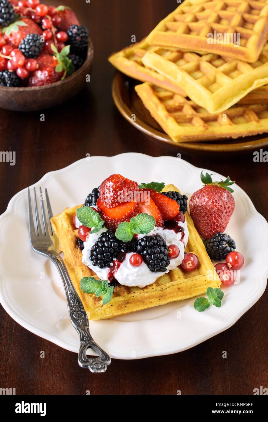Belgium waffles and berry fruits Stock Photo - Alamy