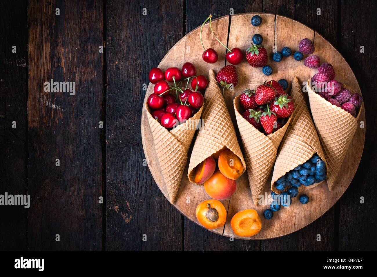 Fresh fruits in cone Stock Photo - Alamy