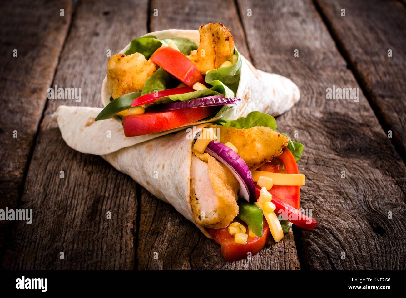 Fried chicken wrap sandwich Stock Photo - Alamy