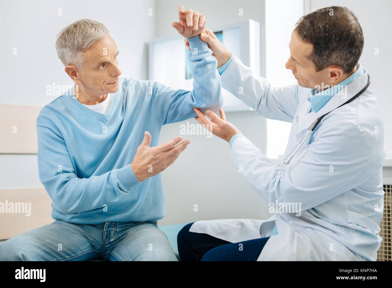Concerned aged man worrying about his health Stock Photo - Alamy