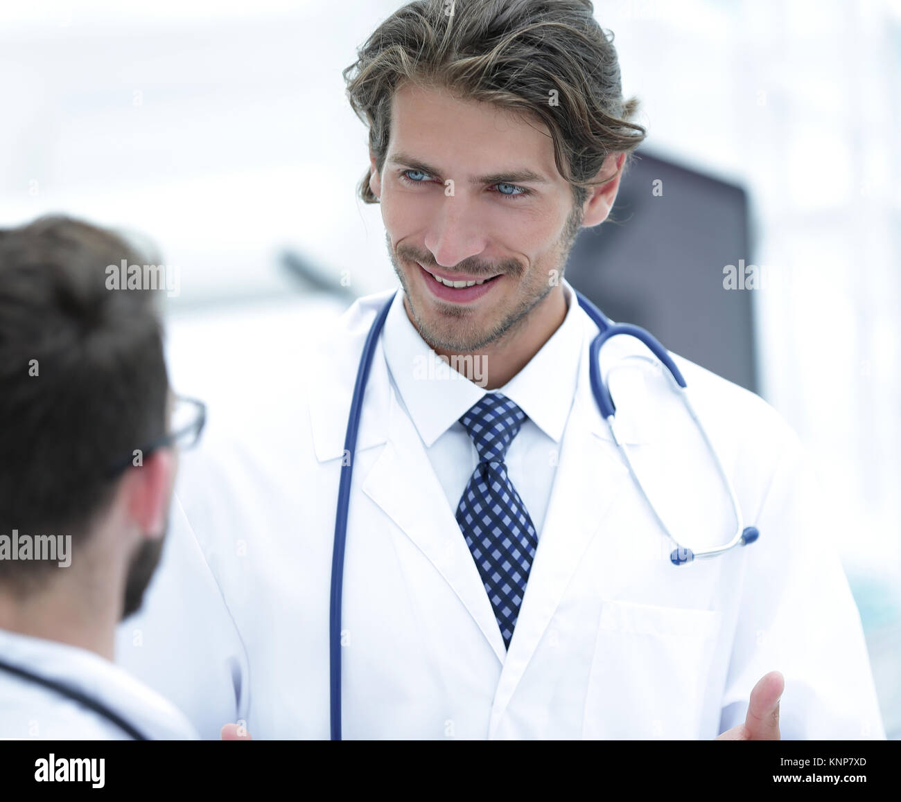 Group of doctors talking Stock Photo - Alamy
