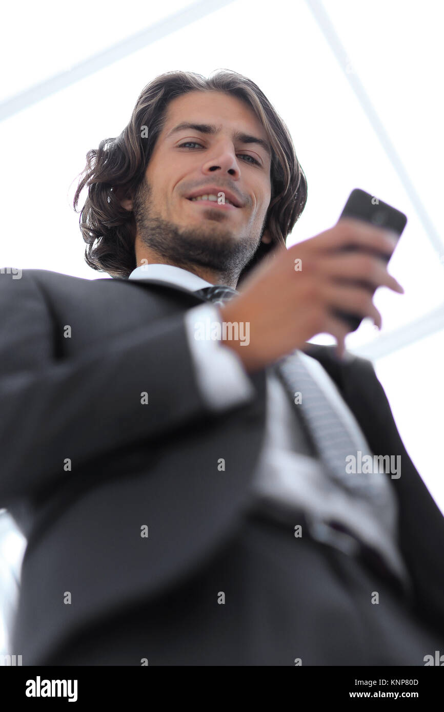 bottom view.business men reading SMS on smartphone Stock Photo - Alamy