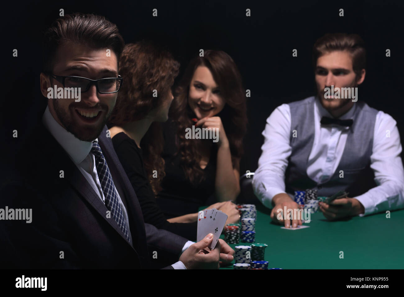 Modern businessman playing poker hi-res stock photography and images ...