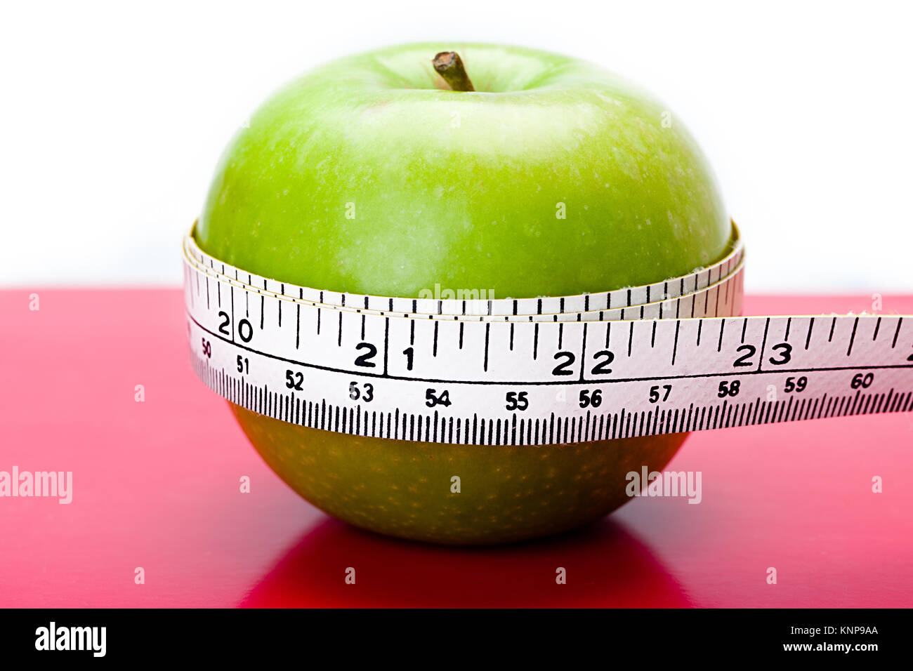 apple on a table Stock Photo - Alamy