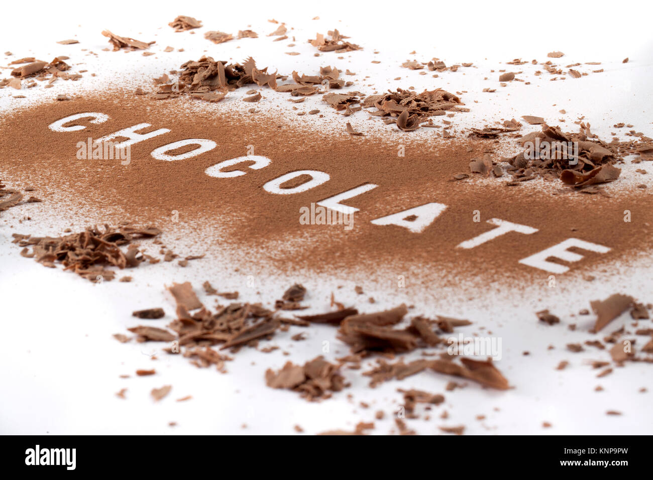 chocolate text in chocolate powder Stock Photo - Alamy