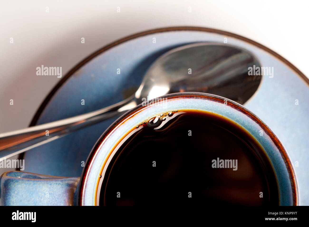 coffee mug with spoon Stock Photo - Alamy