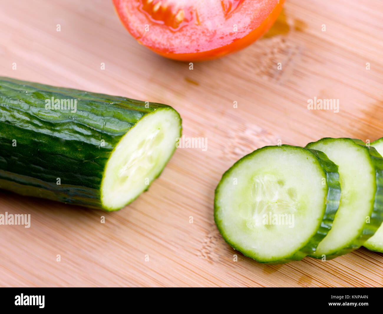 cut cucumber with tomato Stock Photo - Alamy