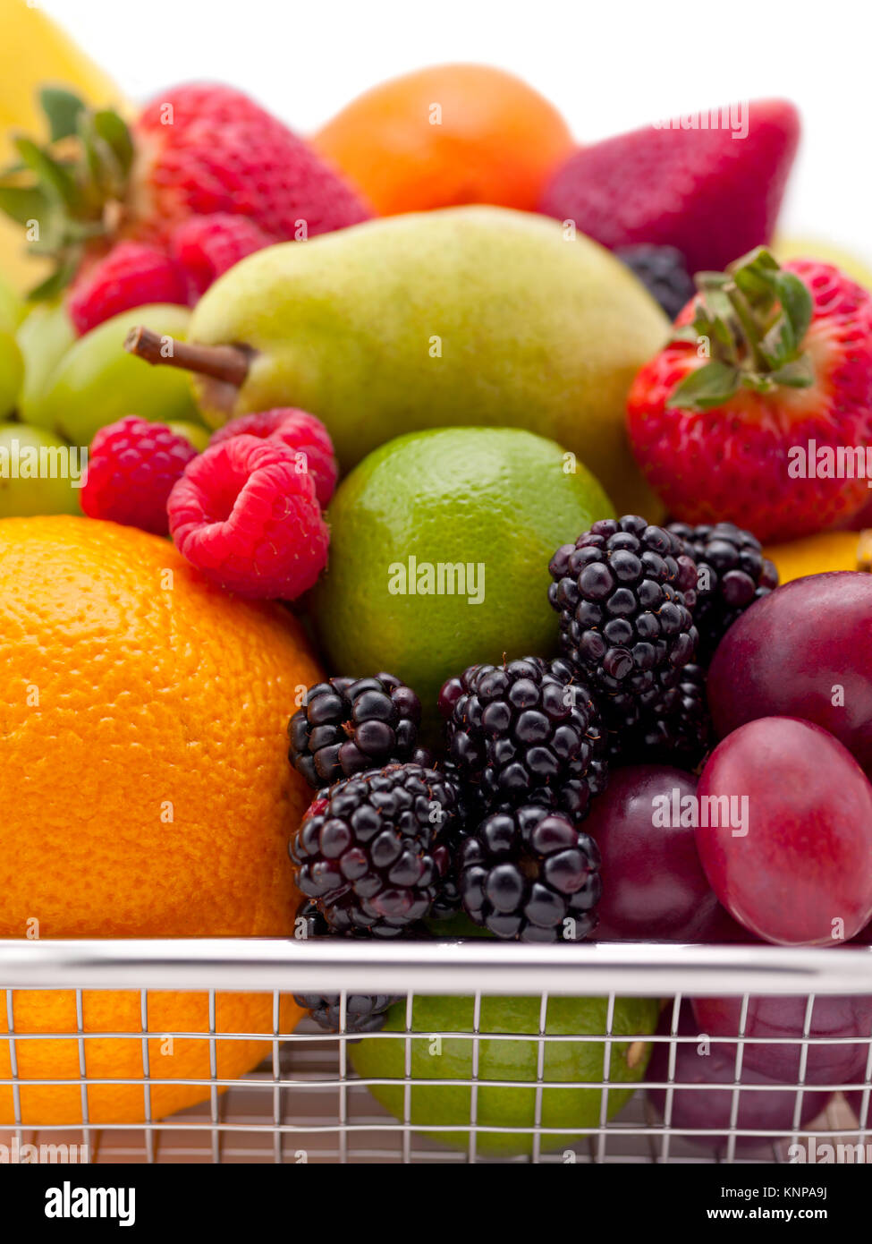 fruit filled shopping basket Stock Photo - Alamy