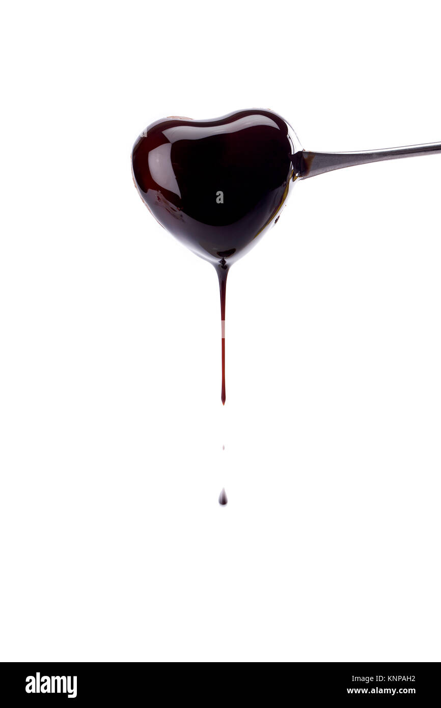 heart shaped coated with chocolate syrup Stock Photo - Alamy