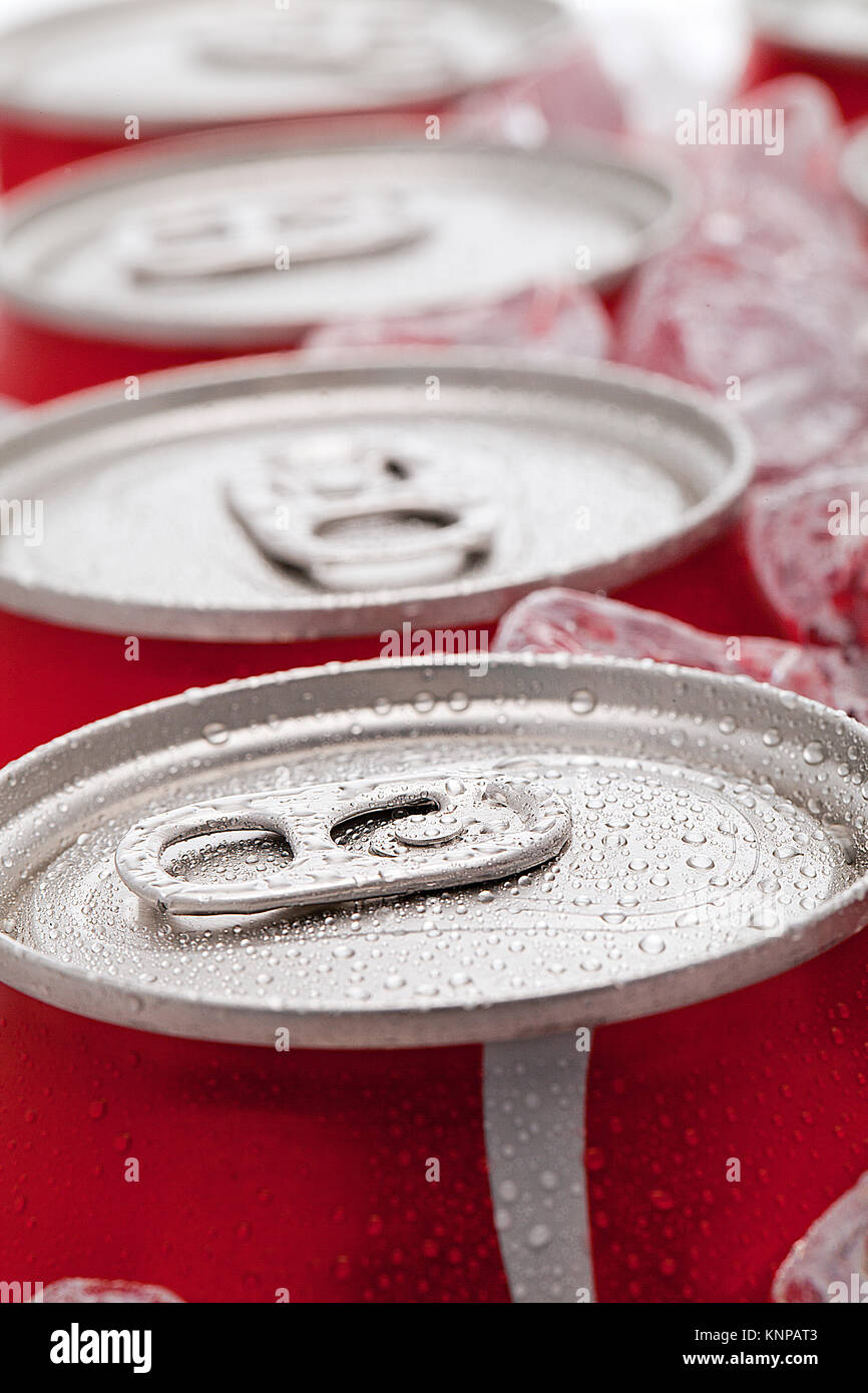 line of pop cans Stock Photo - Alamy