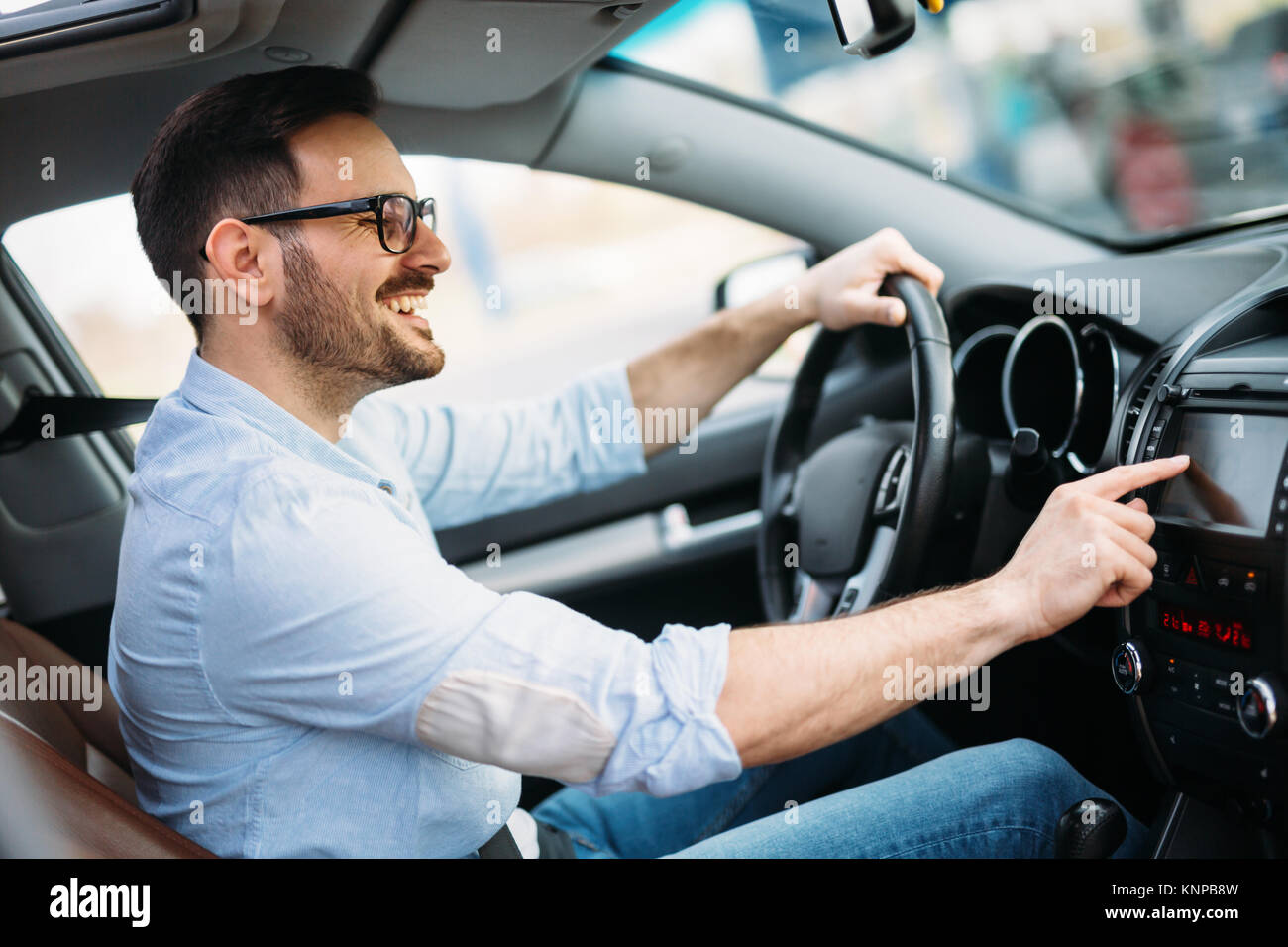 Man Using Gps Navigation System In Car to travel Stock Photo - Alamy