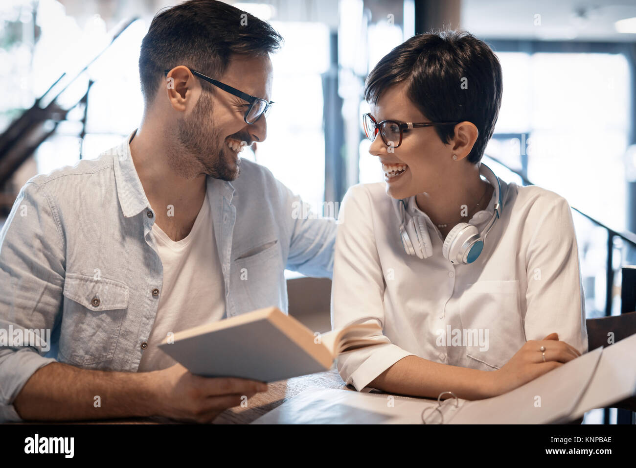 Students couple in school studying for exams together Stock Photo - Alamy