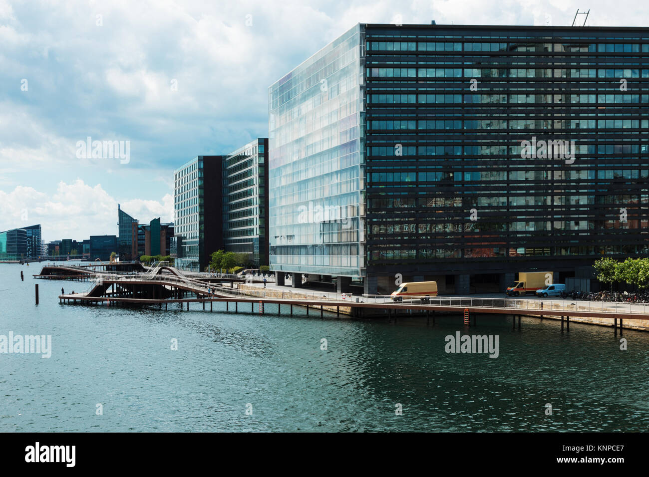 Modern buildings on the river Stock Photo - Alamy
