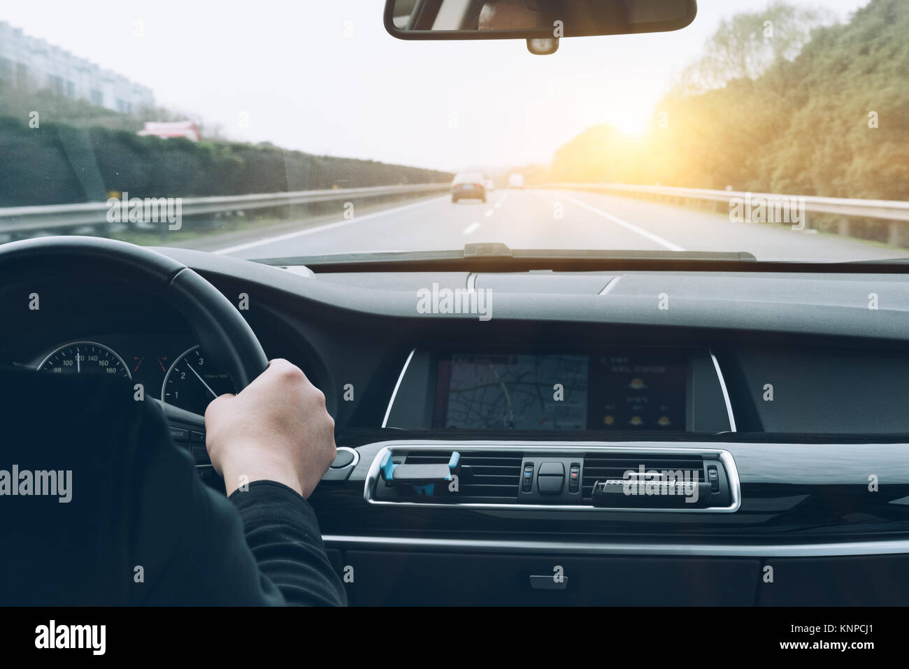 man driving car from rear view on the highway Stock Photo - Alamy