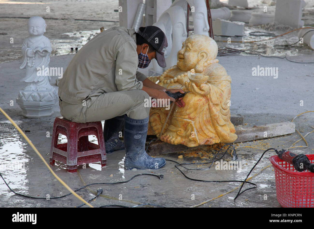 hand carving statues in hanoi vietnam Stock Photo - Alamy