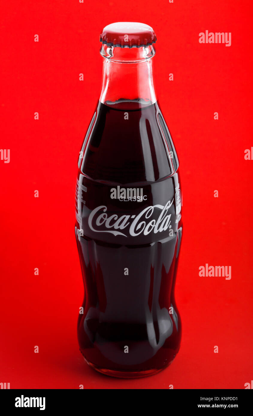 LONDON, UK -DECEMBER 07, 2017: Bottle of Classic Coca-Cola on red ...