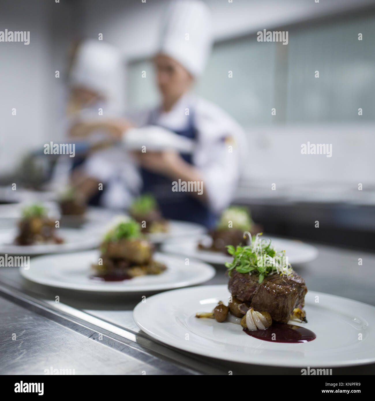 Inside the shimmering kitchen of a gourmet haute cuisine restaurant ...