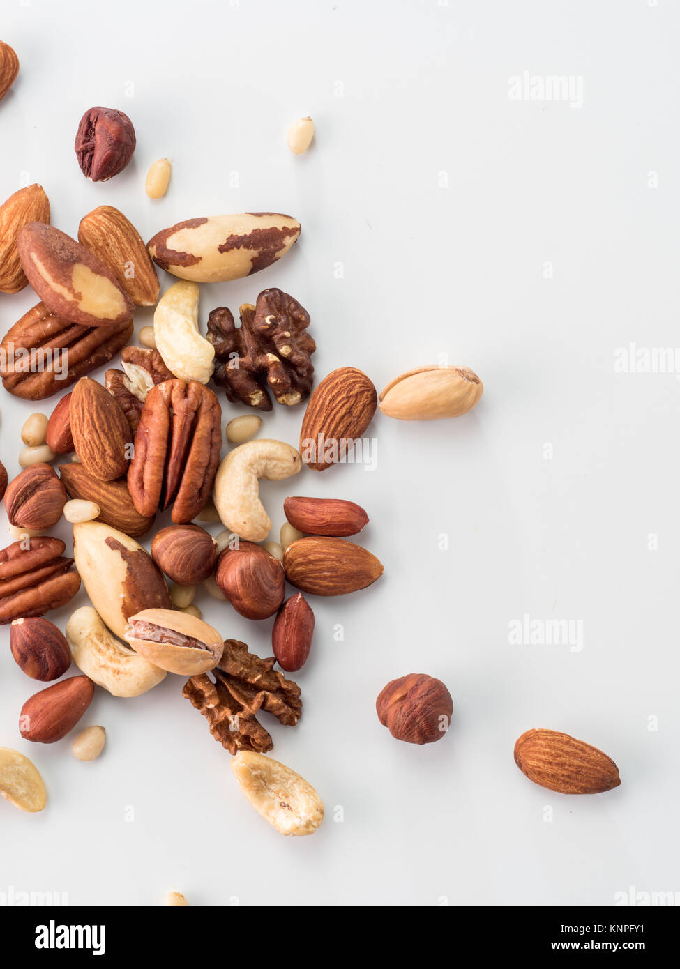 cashew, pecan, pine nuts, hazelnut isolated Stock Photo - Alamy