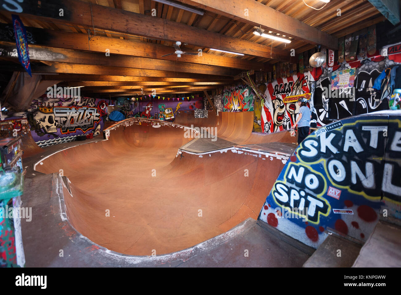Internal skateboard track with many graffiti Stock Photo - Alamy