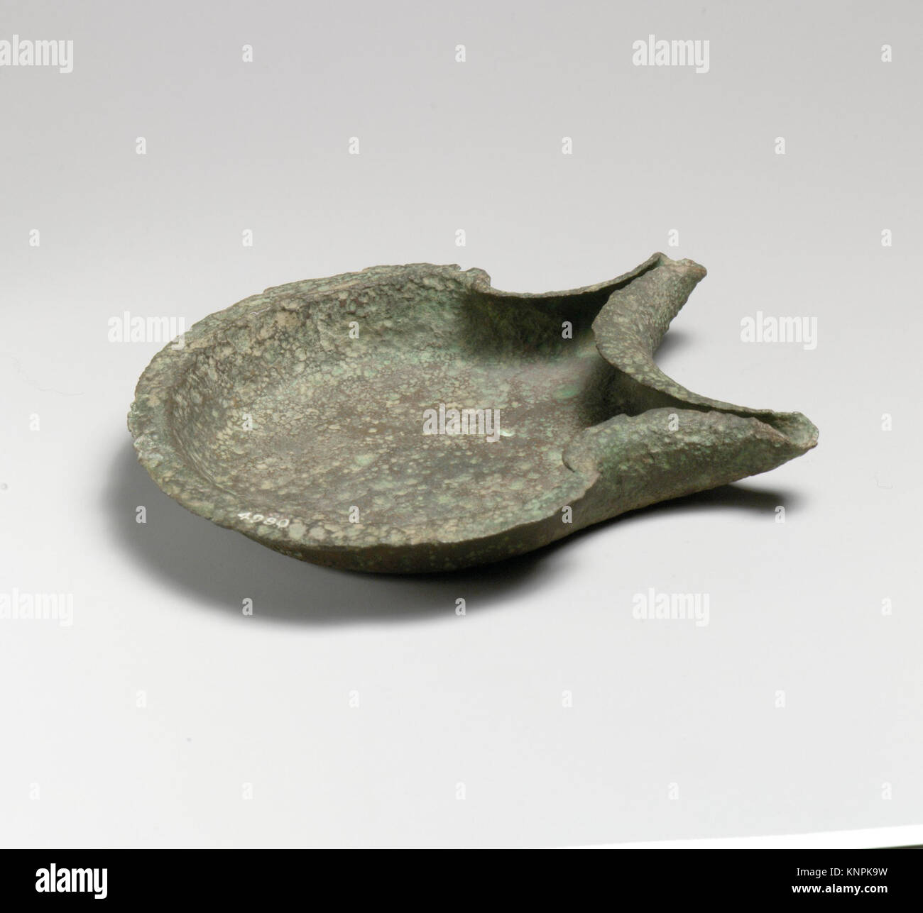A bronze lamp from the MET collection, MET DP20120, representing ...