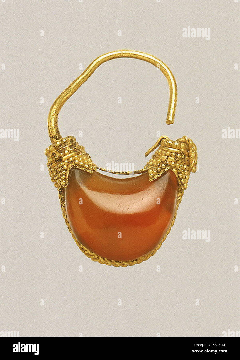A gold and carnelian boat-shaped earring from the MET collection ...