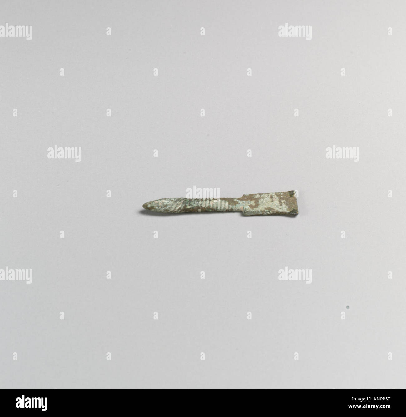 Roman chisel made of bronze and bone, measuring 1 1/4 in., used as a ...