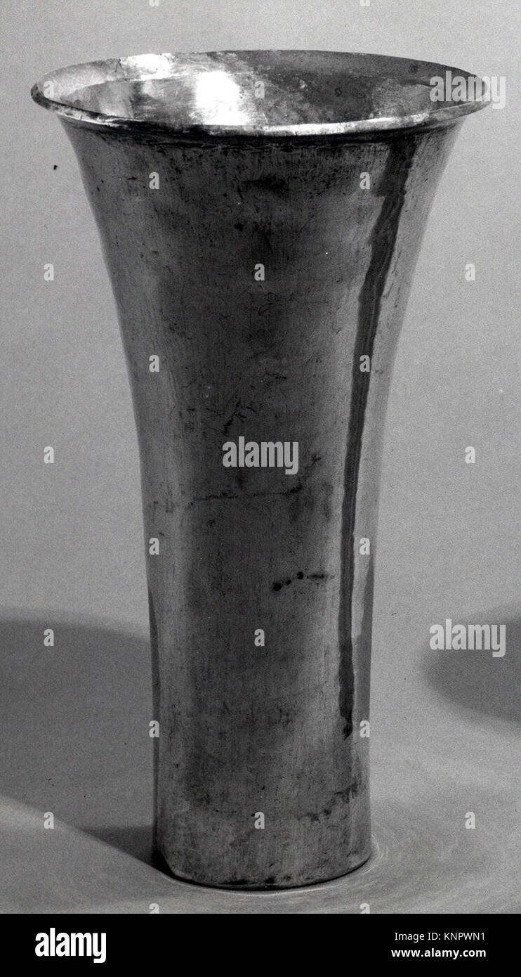This glass beaker, attributed to Syria and dating from the 13th to 14th ...