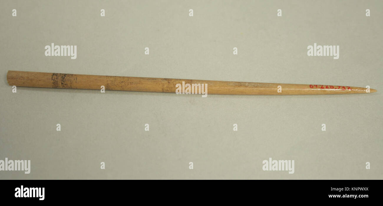 Bone weaving bobbin, a tool used in textile production, demonstrating ...