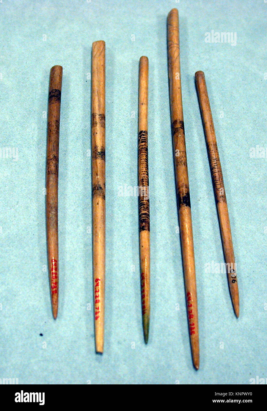 Bone weaving bobbin, a textile tool, illustrating material ...