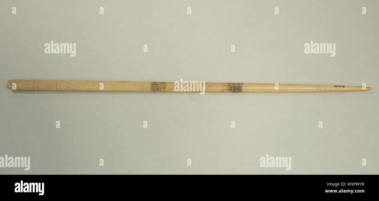 Ancient bone weaving bobbin used for textile production, demonstrating ...
