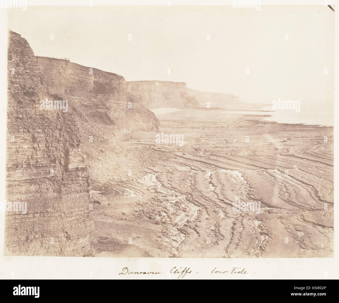 Photograph of Dunraven Cliffs at low tide, showing coastal rock ...