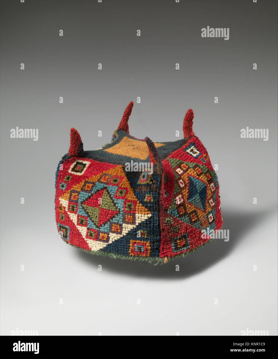 This four-cornered hat, attributed to the Wari culture, is crafted from ...